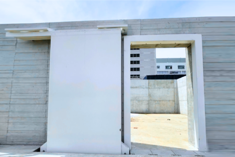 How Sliding & Rolling Flood Gates Protect US Buildings – Orange Flood ...